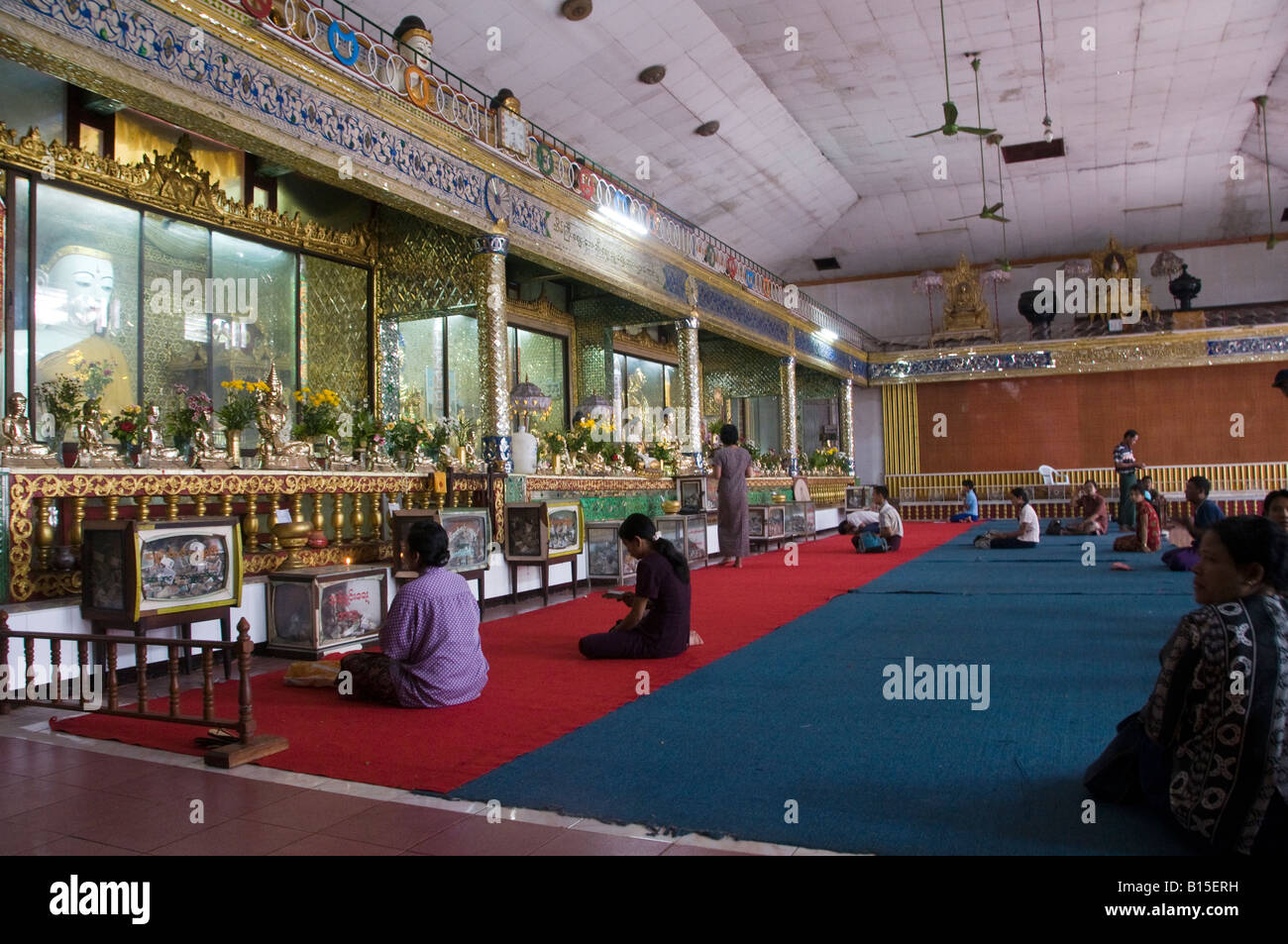 Buddhist devotees at prayer in a Buddhist lamasery in the center town ...