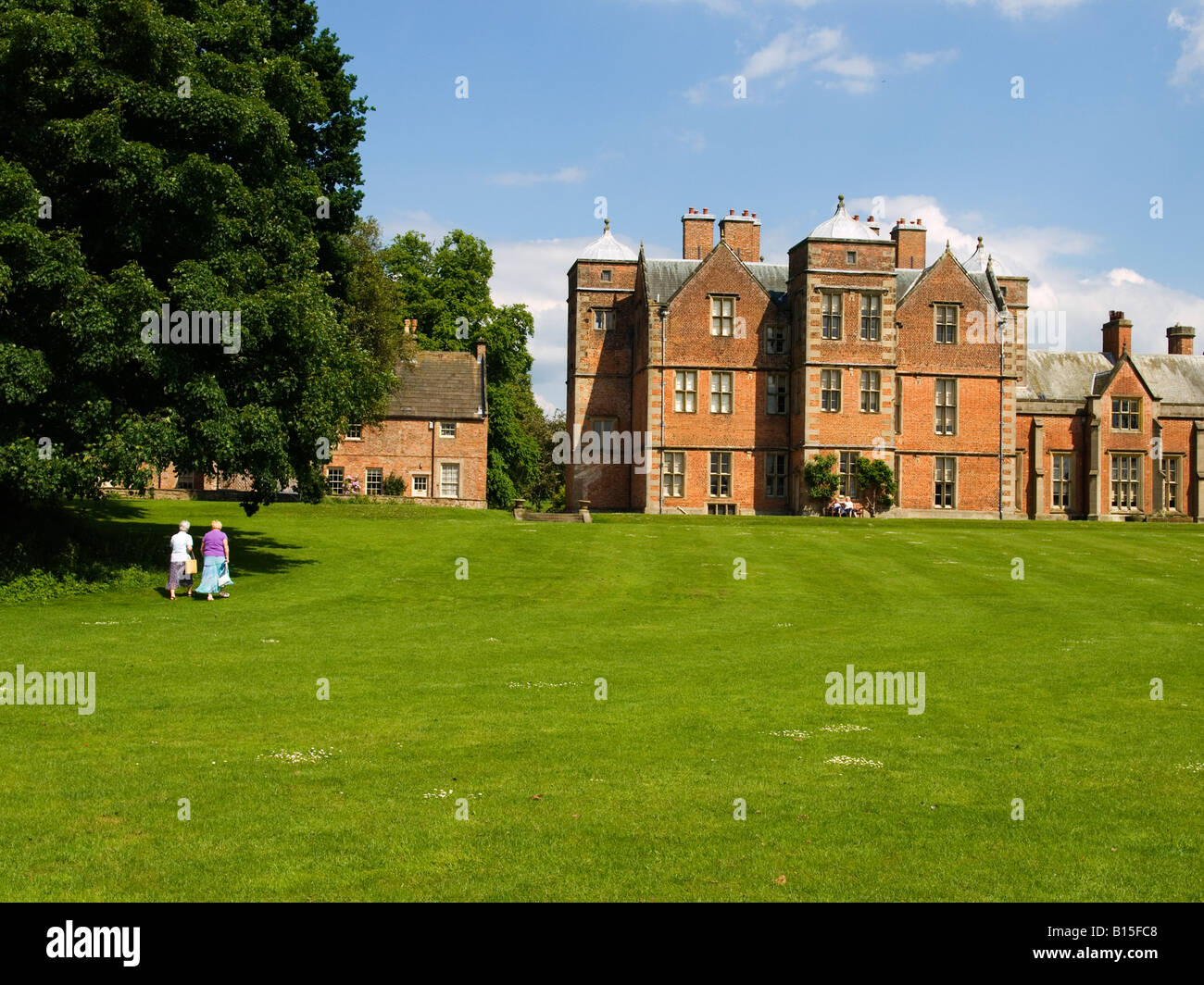 Two women walking towards the west side of Kiplin Hall near Scorton ...