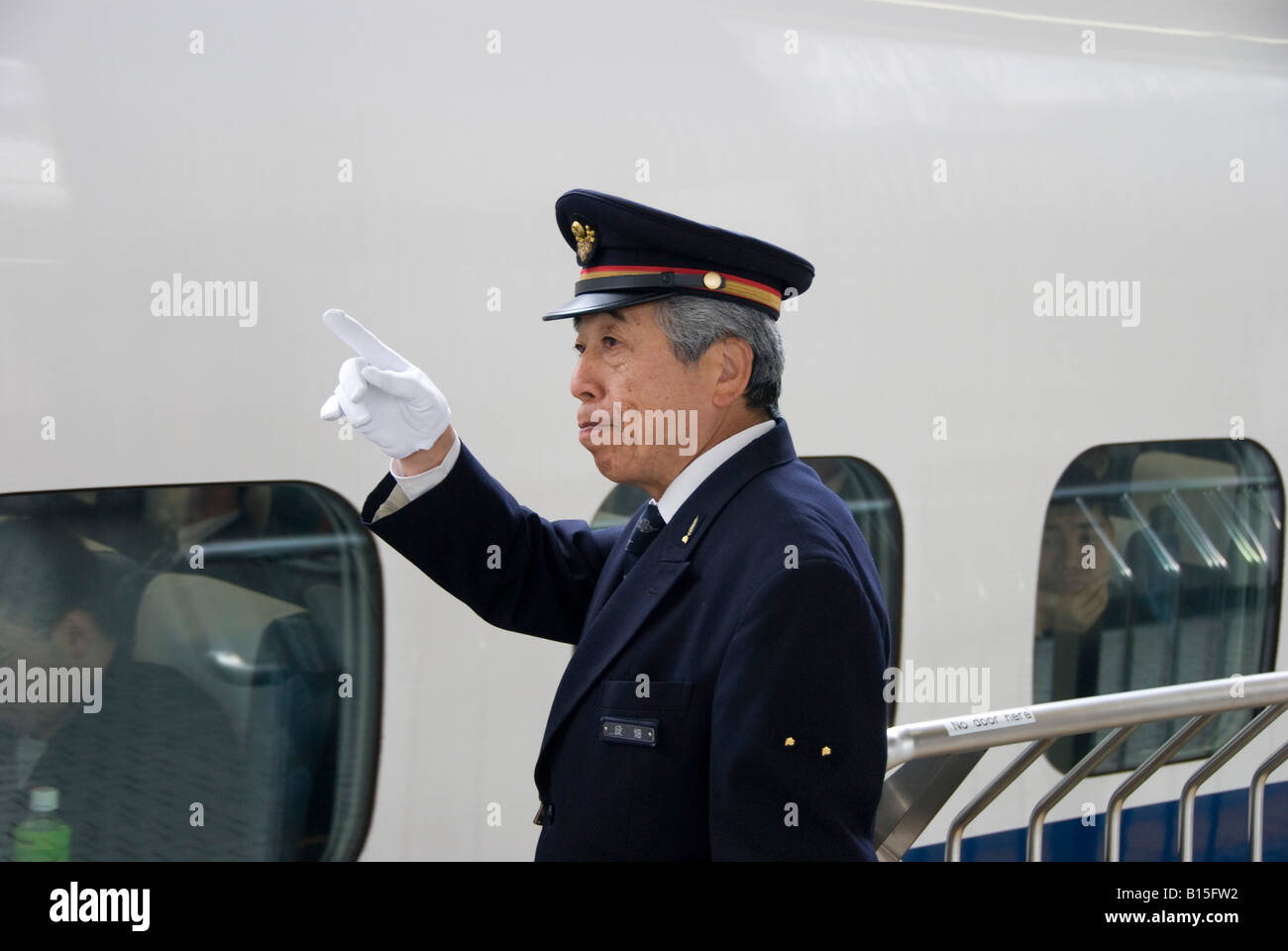 Japanese bullet train guard uniform hi-res stock photography and images ...