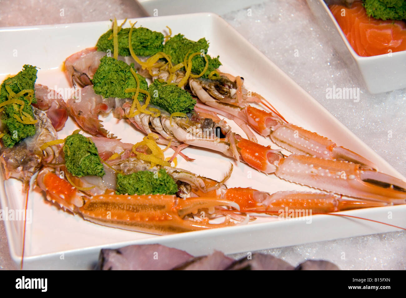 Scampi with spices and vegetables Stock Photo - Alamy