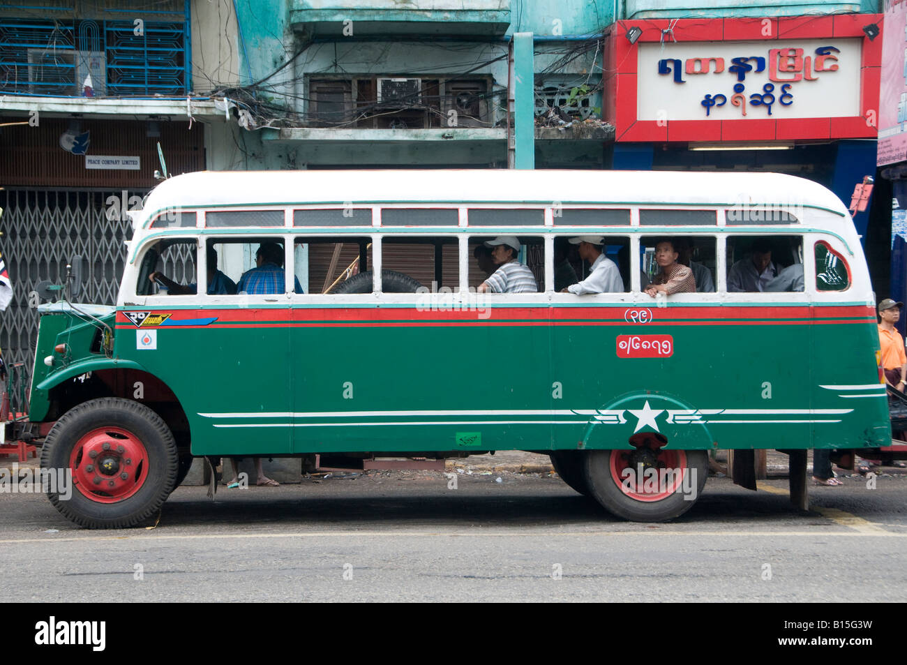 An old post-Colonial Chevrolet based bus in downtown Yangon, Myanmar ...