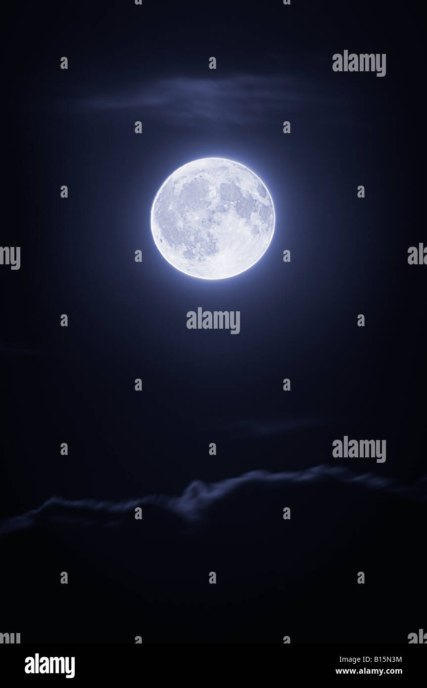 Full moon with clouds at night Stock Photo - Alamy