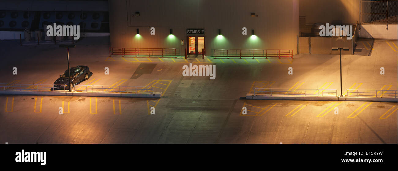 lone car in a car park at night Stock Photo - Alamy
