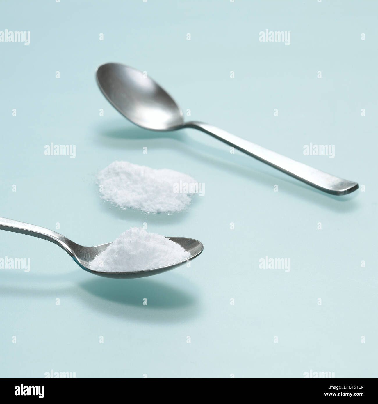 Teaspoons and salt, close-up Stock Photo - Alamy