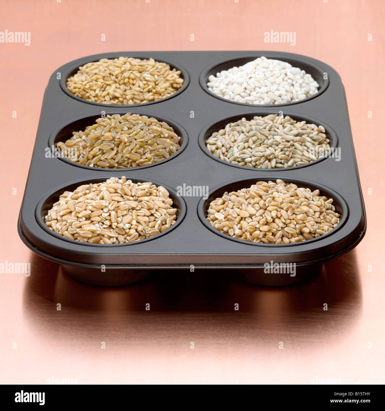 Variety of grains in baking dish Stock Photo - Alamy