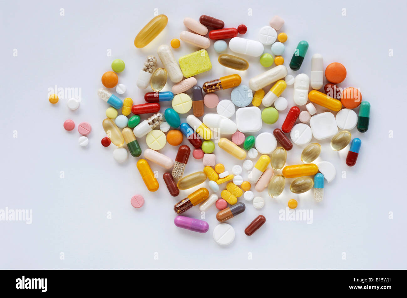 Several tablets and capsules close-up Stock Photo - Alamy
