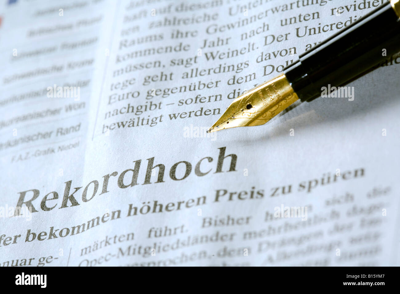 Pen on newspaper, close-up Stock Photo - Alamy