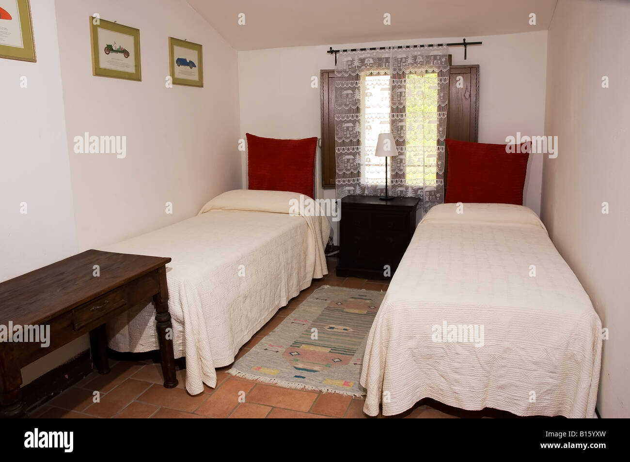 Two single beds in a rustic hotel room for children Countryside of ...