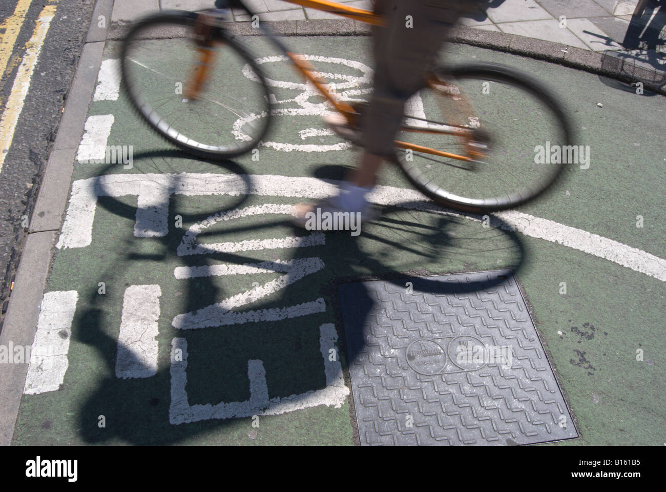 moving cyclist on cycle path in kingston upon thames, southwest london ...