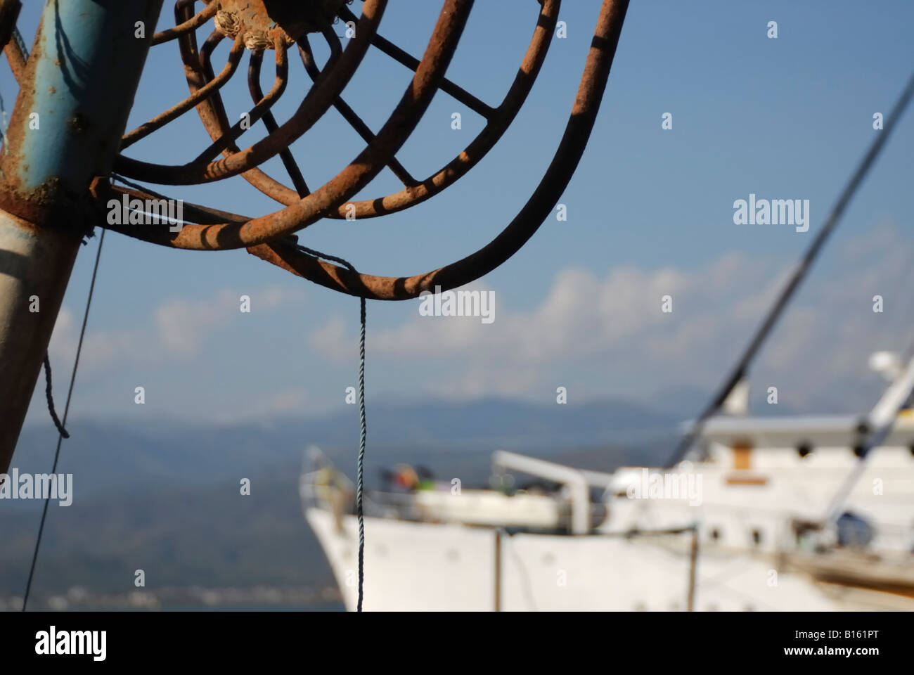 A fishing tool on the white boat sea background Stock Photo - Alamy