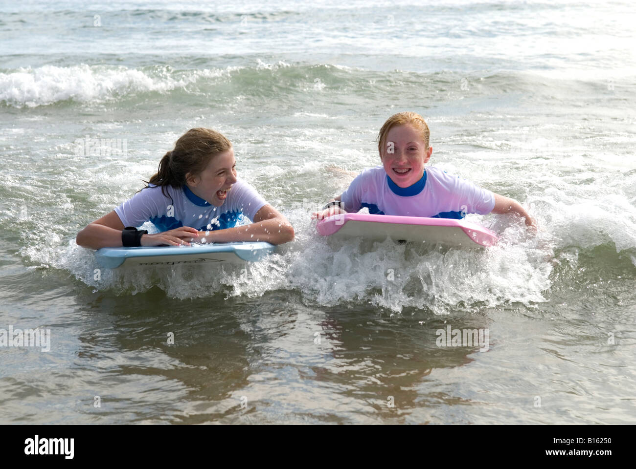 Girls Body Boarding Gower Stock Photo - Alamy