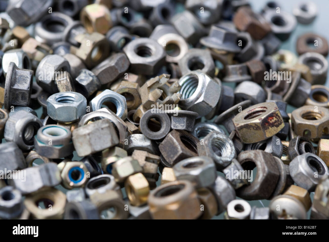 A collection of nuts without bolts assorted, threaded nuts, nut threads ...