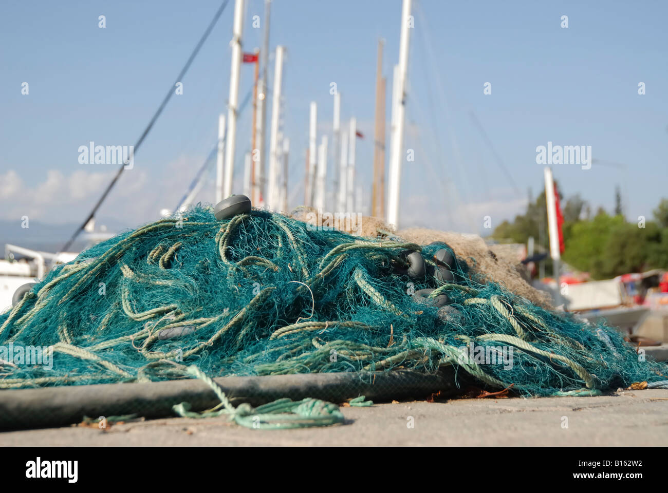 A fishing net on the sea boats background Stock Photo - Alamy
