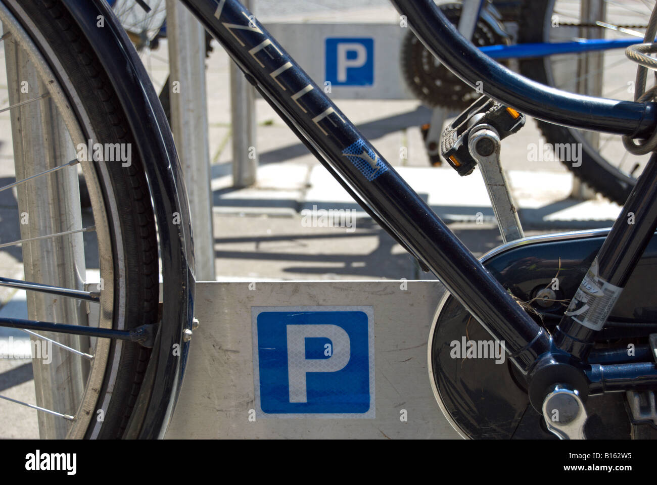 cycles parked at council racks with cycle parking signs, in kingston ...