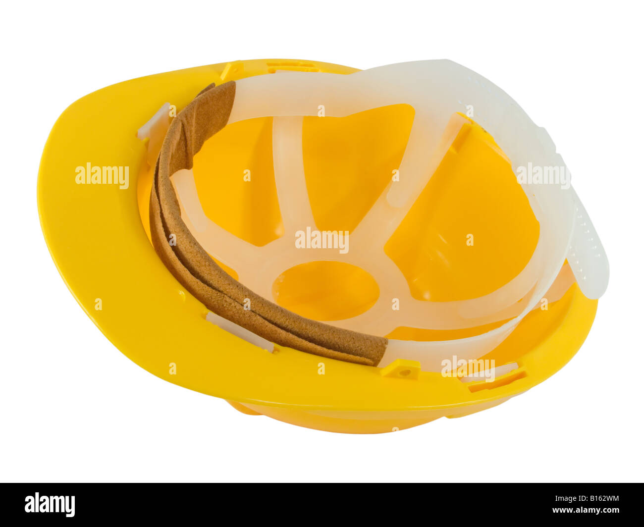 New yellow hardhat isolated on white background Stock Photo - Alamy