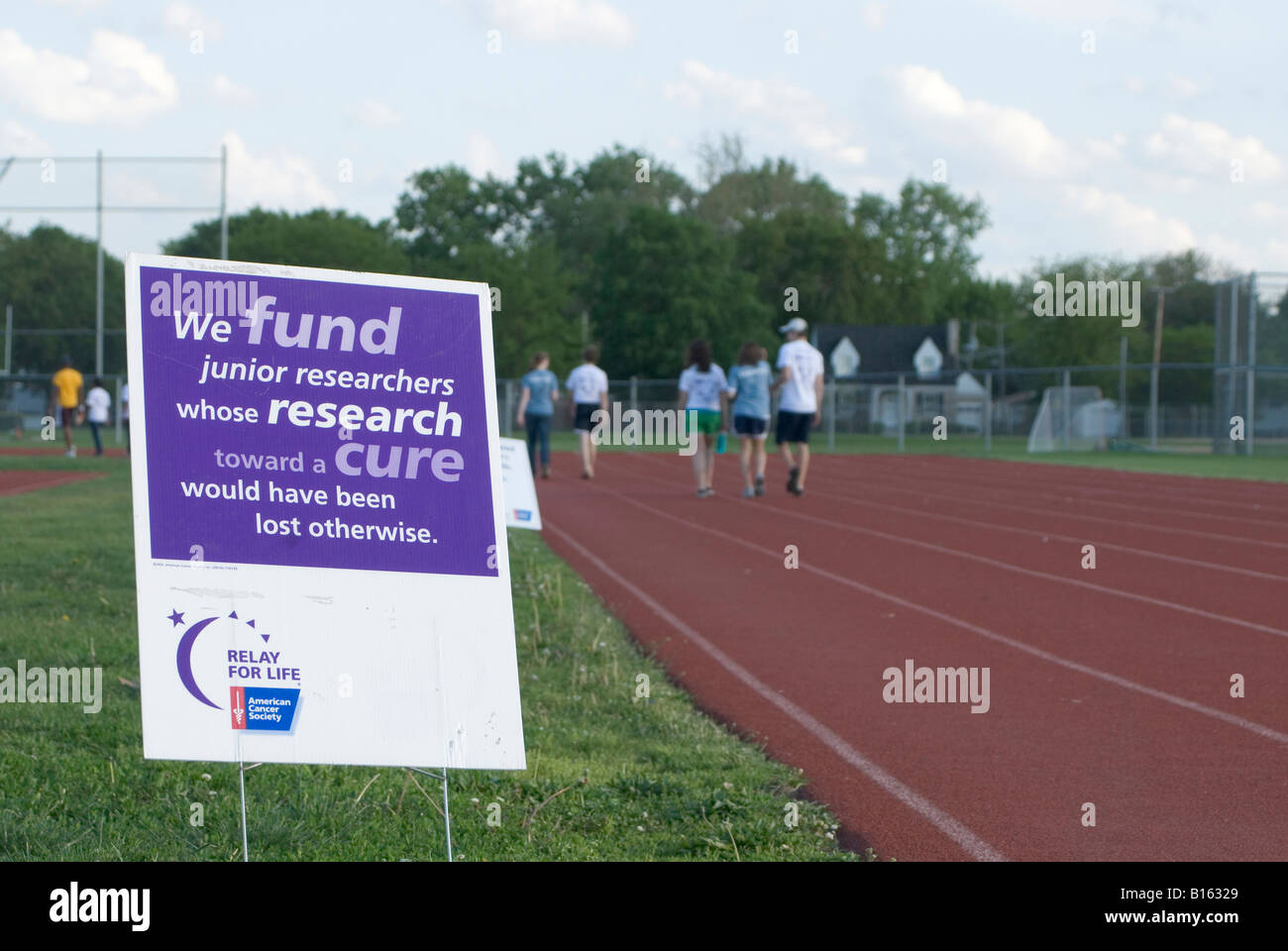 Volunteers walking at a Relay for Life rally for the American Cancer ...