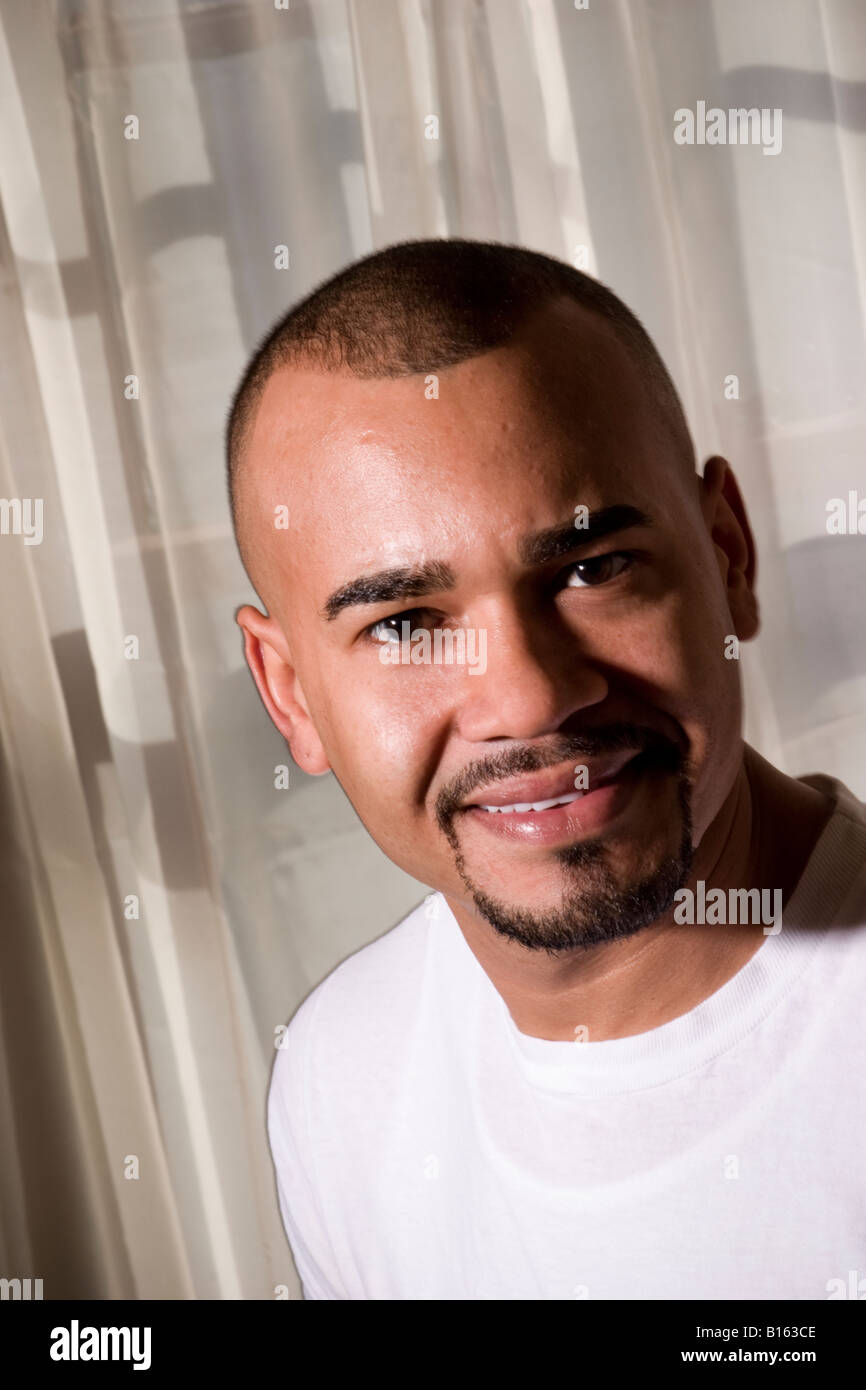 Young Hispanic man with a mustache and beard posing MODEL RELEASED ...
