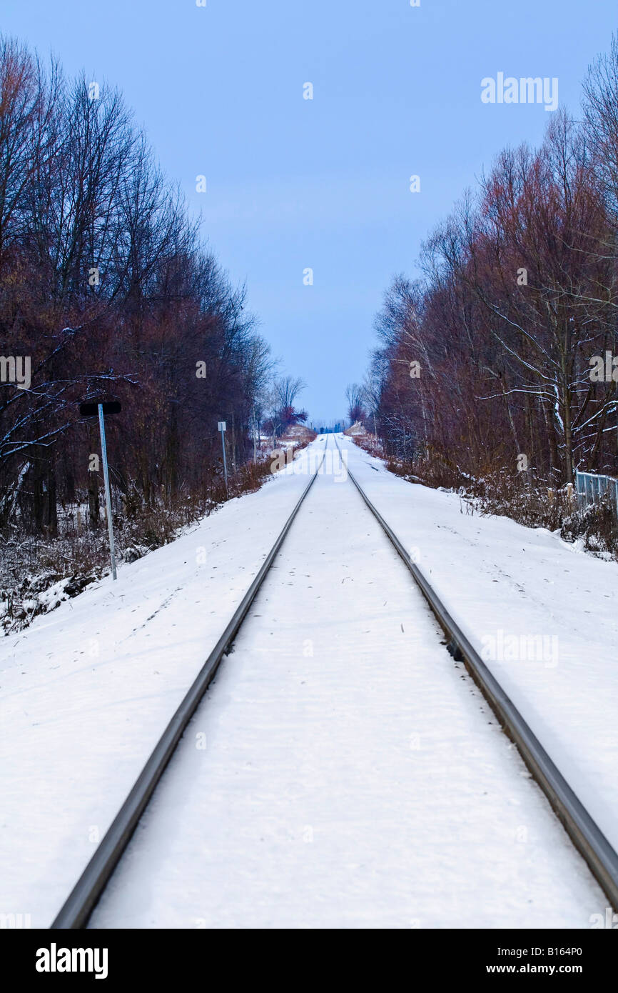 Railway lines winter scene perspective Stock Photo - Alamy