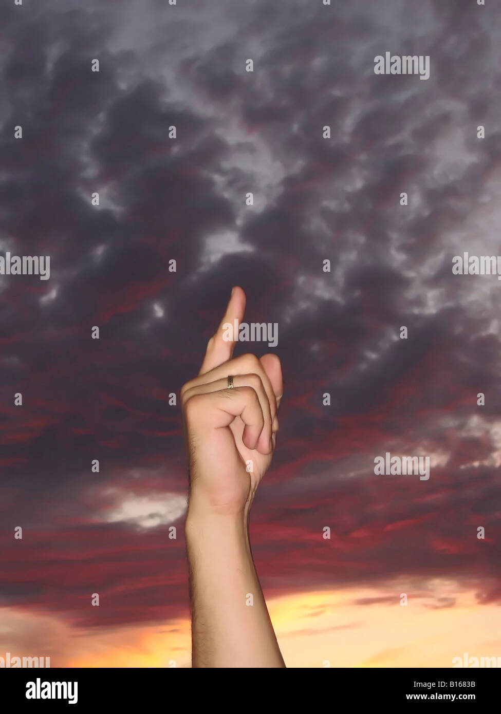 Hand with finger pointing to heaven hi-res stock photography and images ...