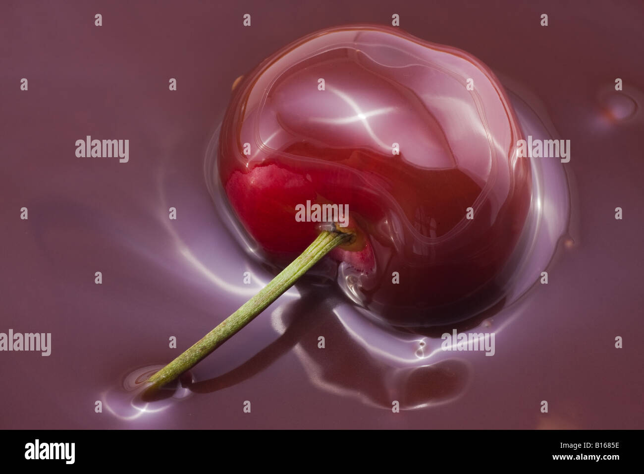 Red Cherry in Chocolate, Macro Stock Photo - Alamy