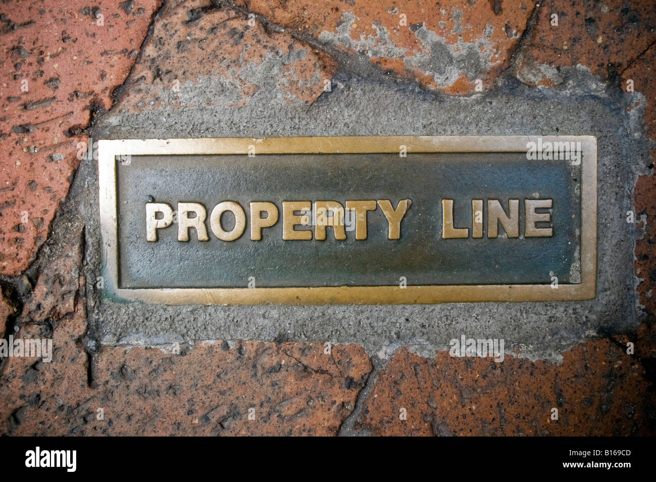 Sign delineates end of property for an office building in New York ...
