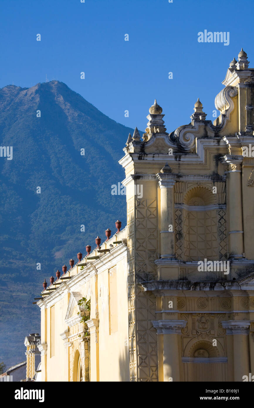 Church with volcano in the background in the colonial style town of ...