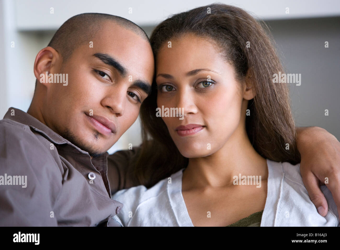 African American couple hugging Stock Photo - Alamy