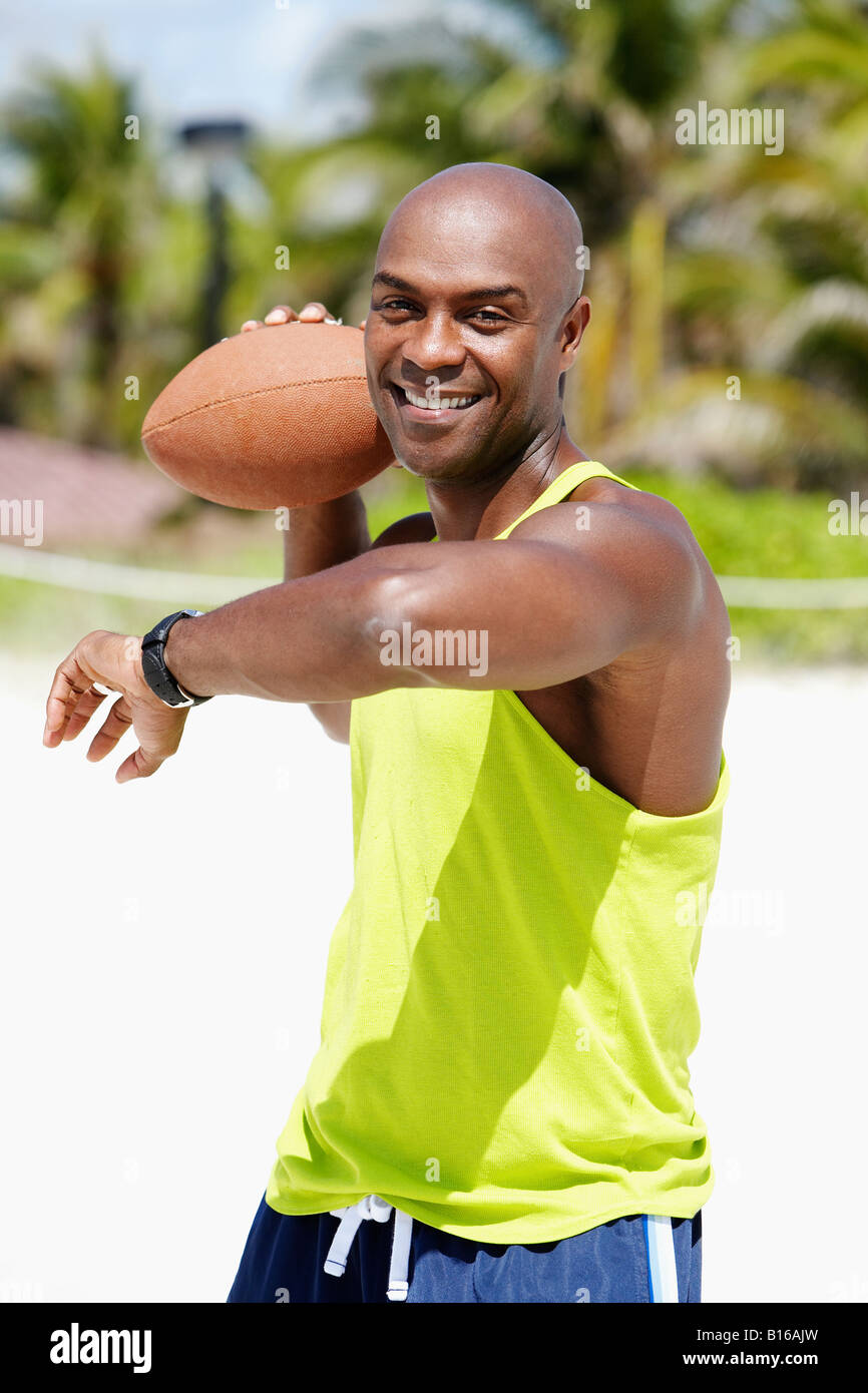African American man throwing football Stock Photo - Alamy