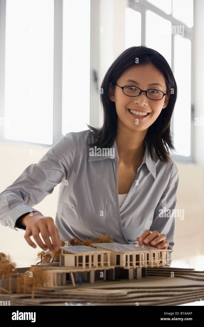 Asian female architect building model Stock Photo - Alamy