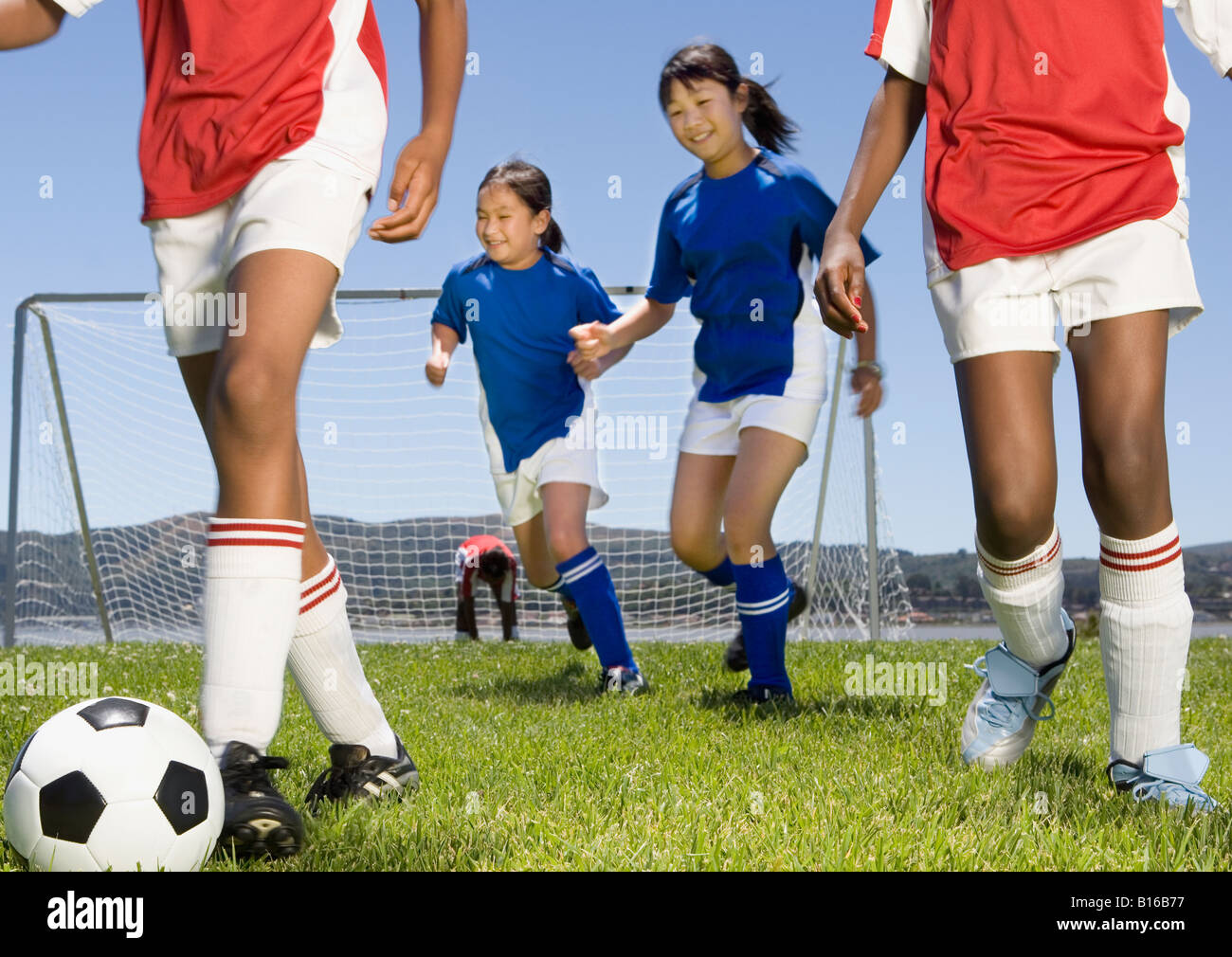 Happy children playing native american hi-res stock photography and ...