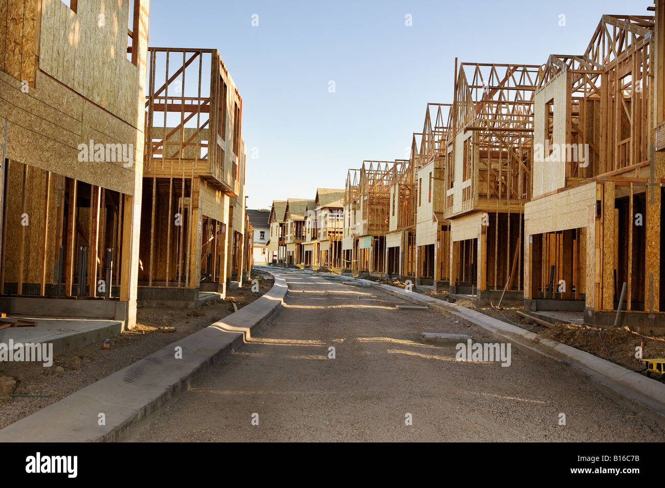 Road through residential construction site Stock Photo - Alamy