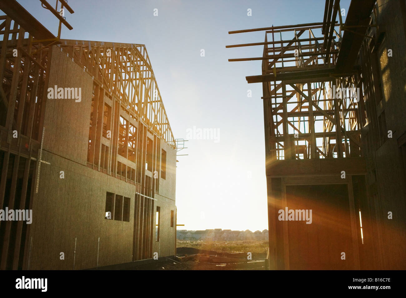 Sun shining on residential construction site Stock Photo - Alamy