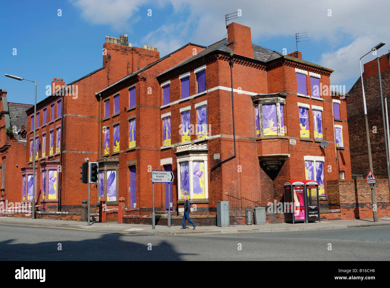 Housing on Edge Lane in Liverpool boarded up with colorful artwork in ...