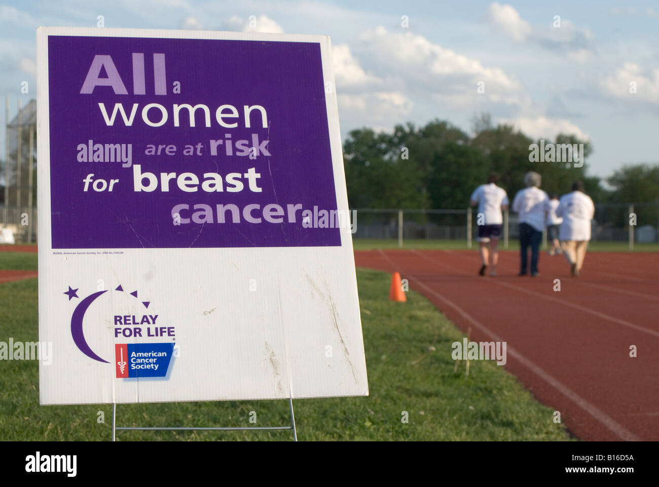 Volunteers walking at a Relay for Life rally for the American Cancer ...
