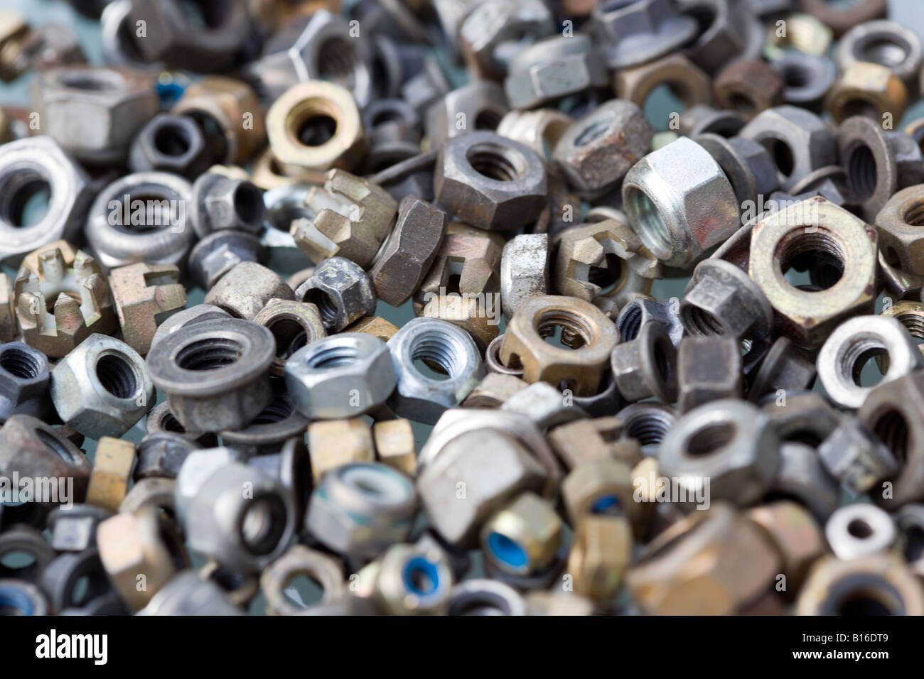 A collection of nuts without bolts assorted, threaded nuts, nut threads ...