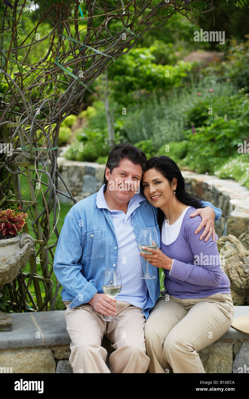 Hispanic couple drinking wine Stock Photo - Alamy