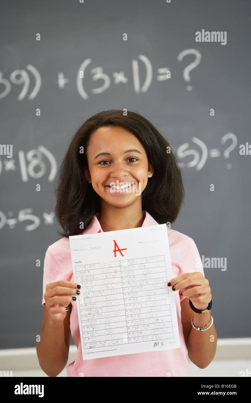 Child holding up paper hi-res stock photography and images - Alamy