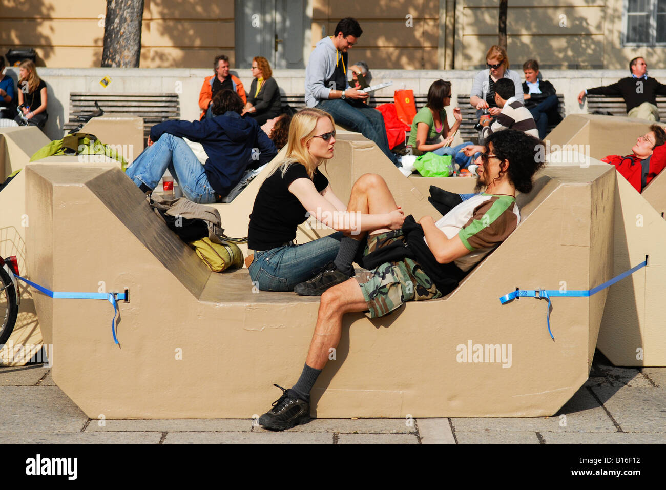 Austria Vienna Wien Youngsters enjoy sun on the futuristic loungers in ...