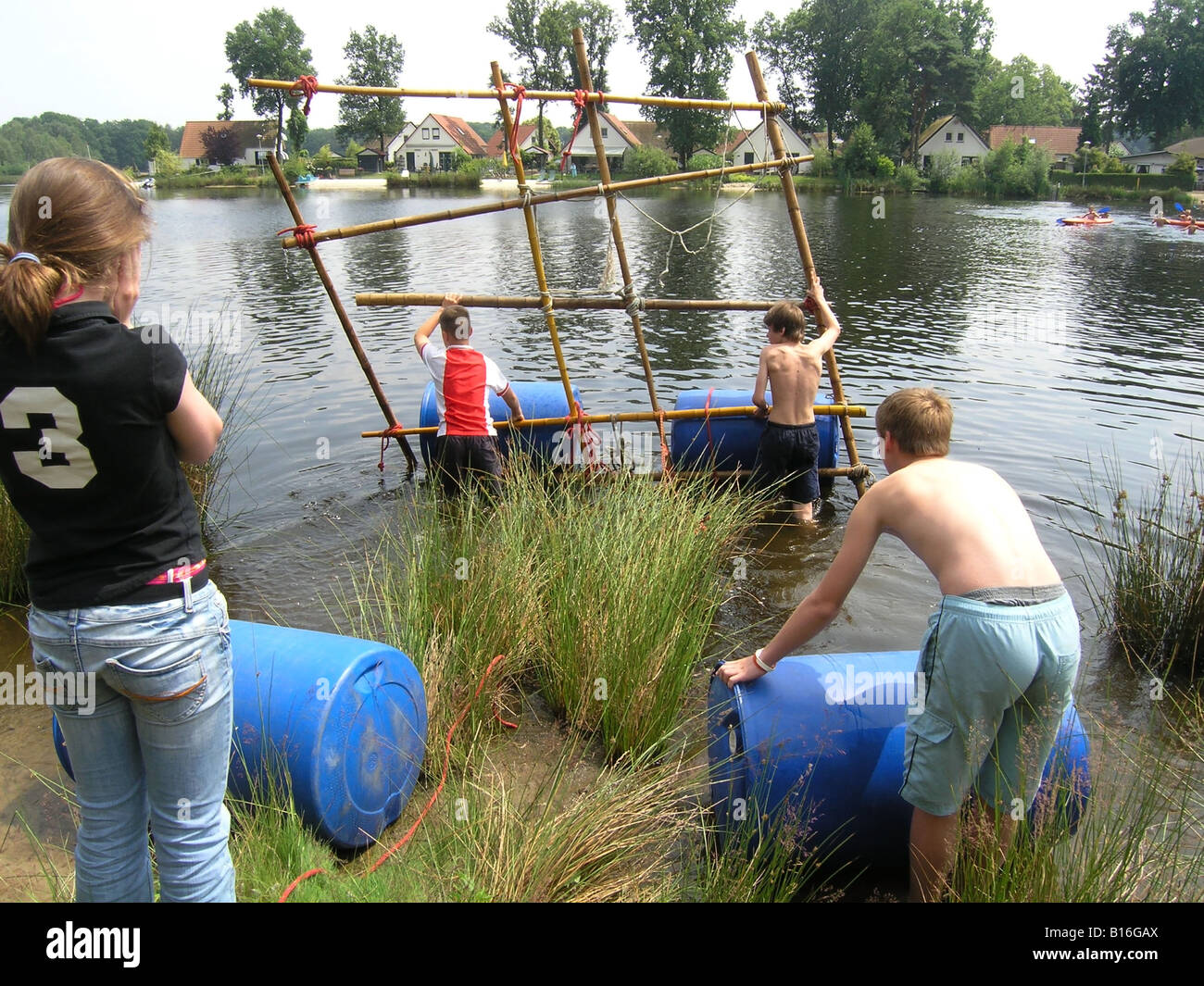 school children building and floating a raft Stock Photo - Alamy