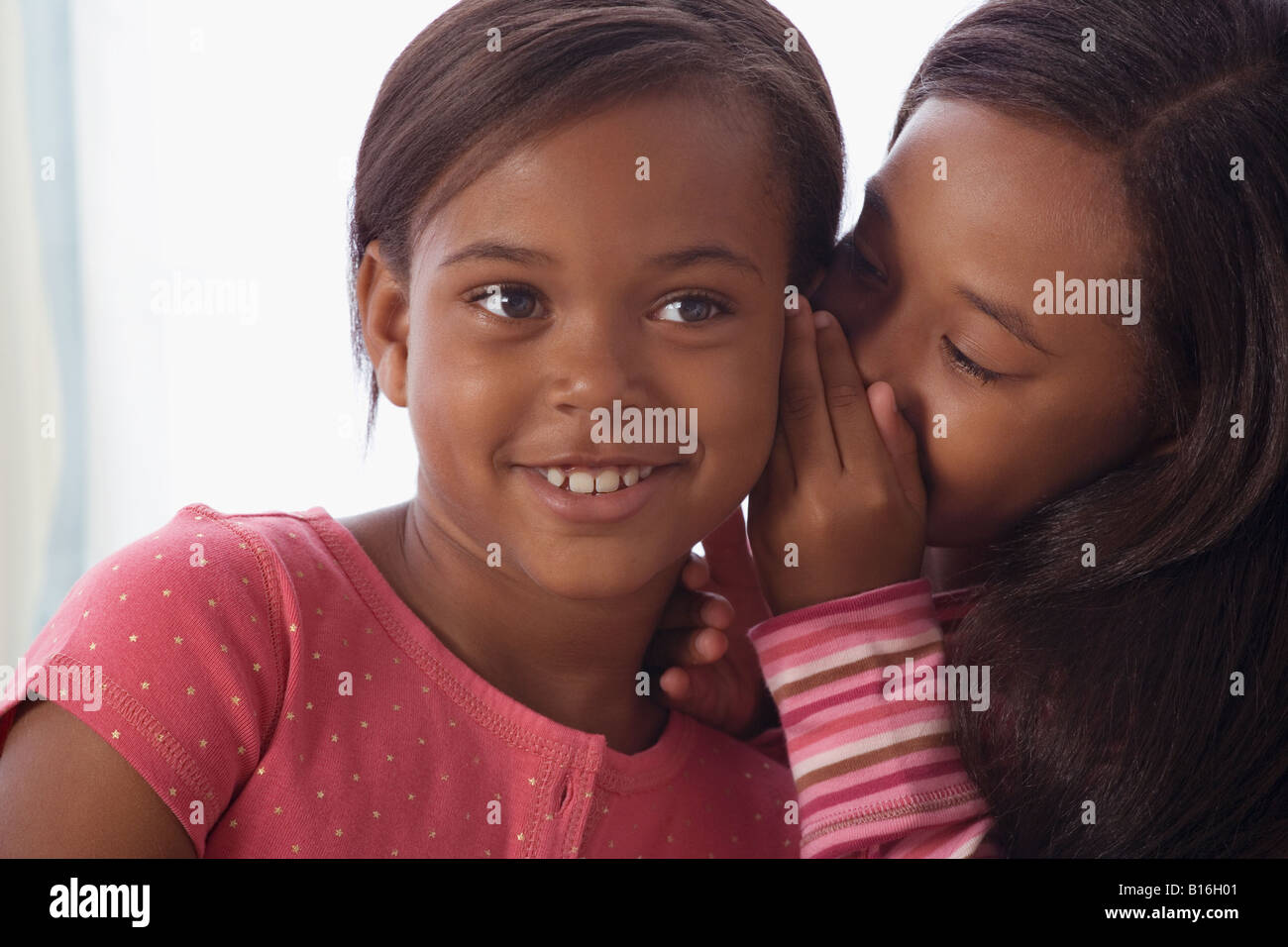 Children Telling A Secret