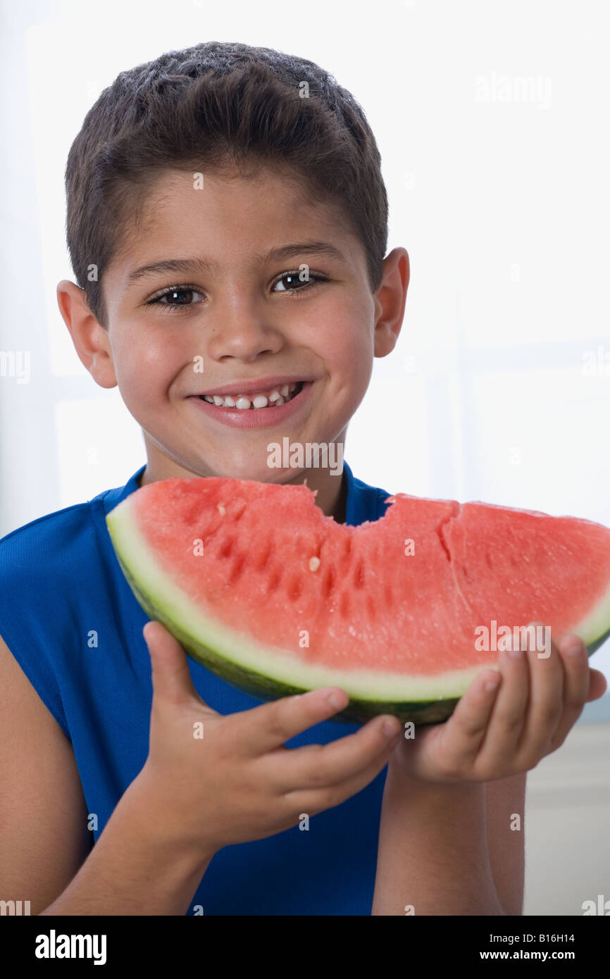 Close up boy holding watermelon hi-res stock photography and images - Alamy