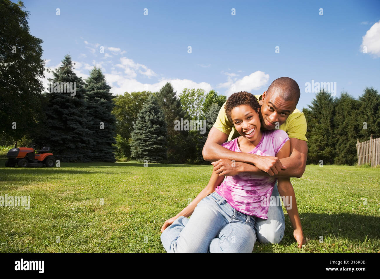 African American couple hugging Stock Photo - Alamy