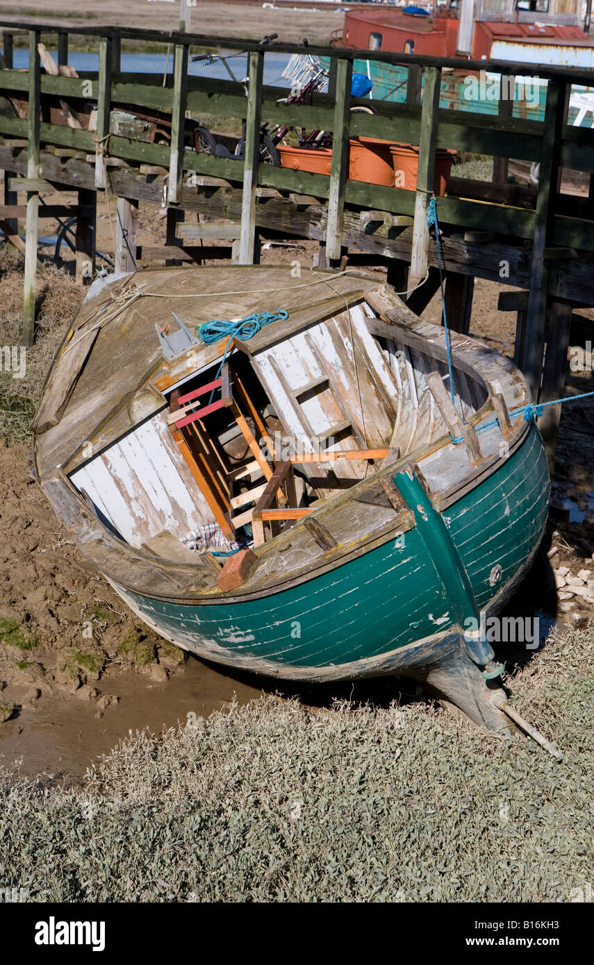 Old traditional wooden boat on a beach in the south coast of England UK ...