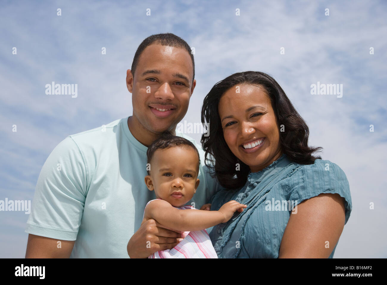African American parents and baby outdoors Stock Photo - Alamy