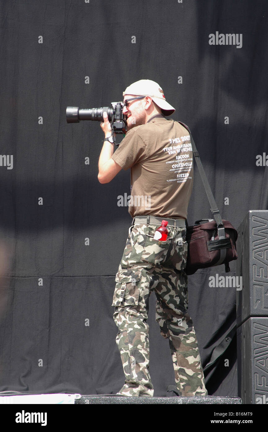 photographer at work at rock concert Stock Photo - Alamy
