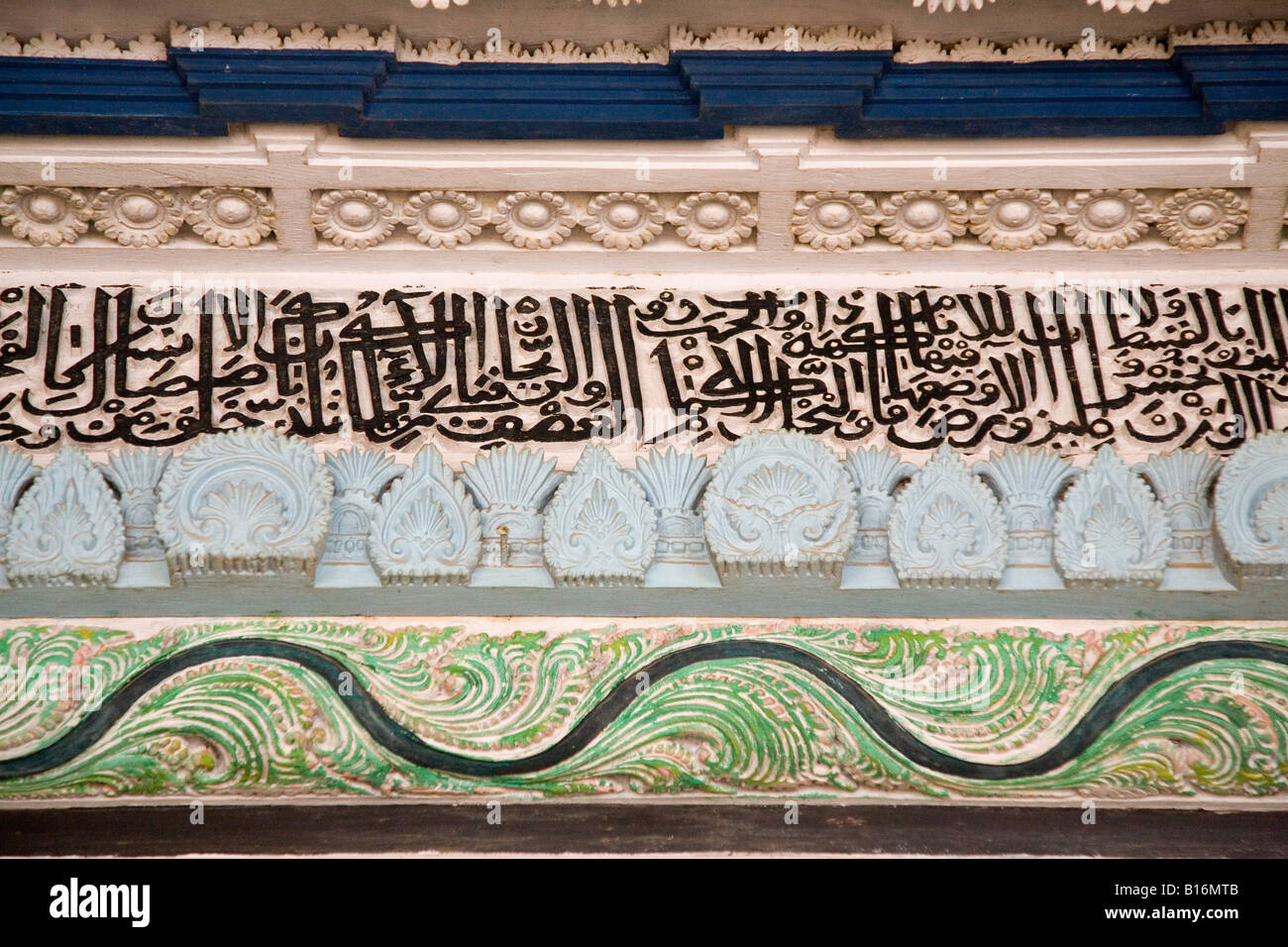 Calligraphy and ornate carving in the ceilings of one of the mosques in ...