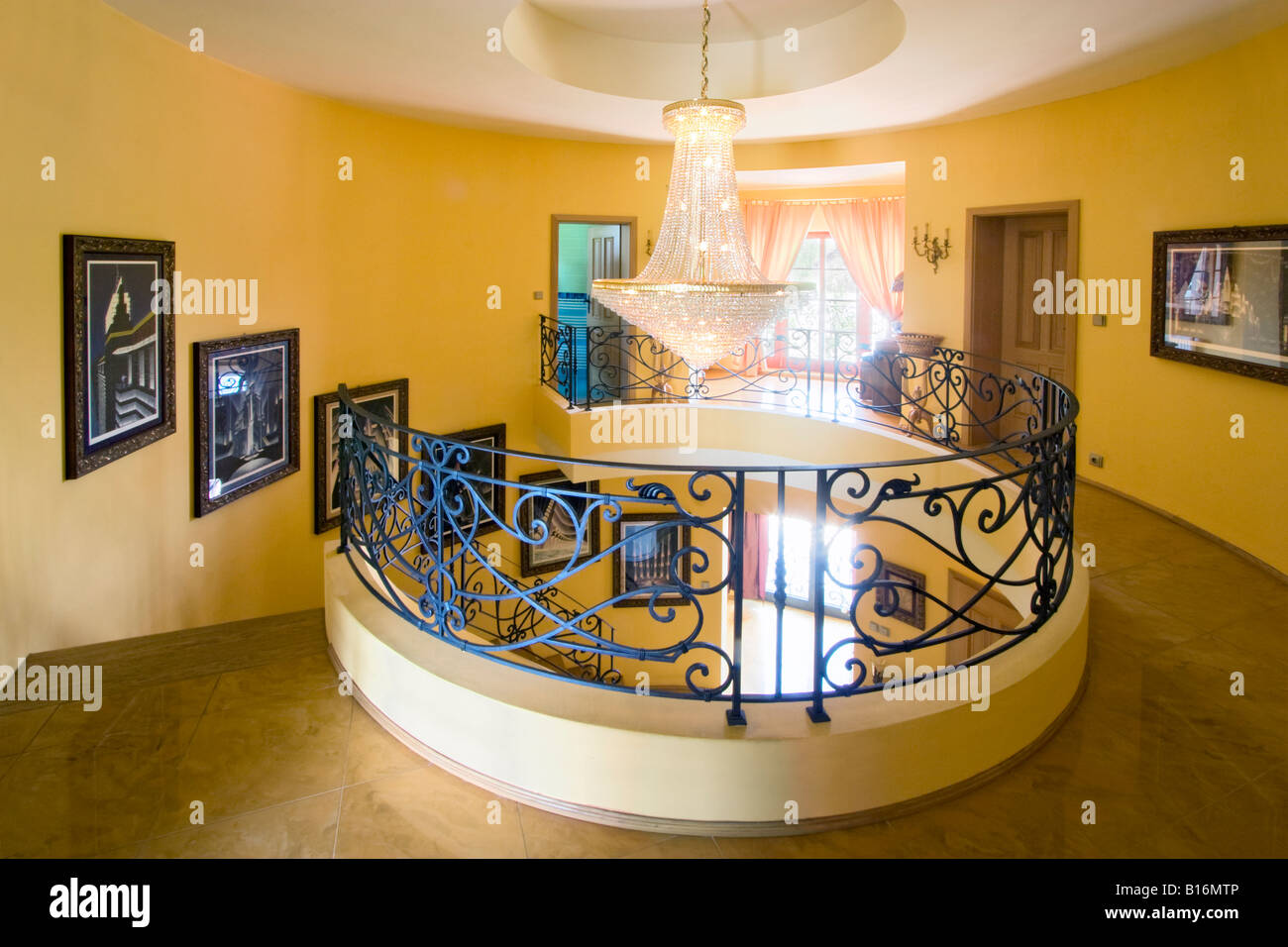 Winding stairs in hall Stock Photo - Alamy