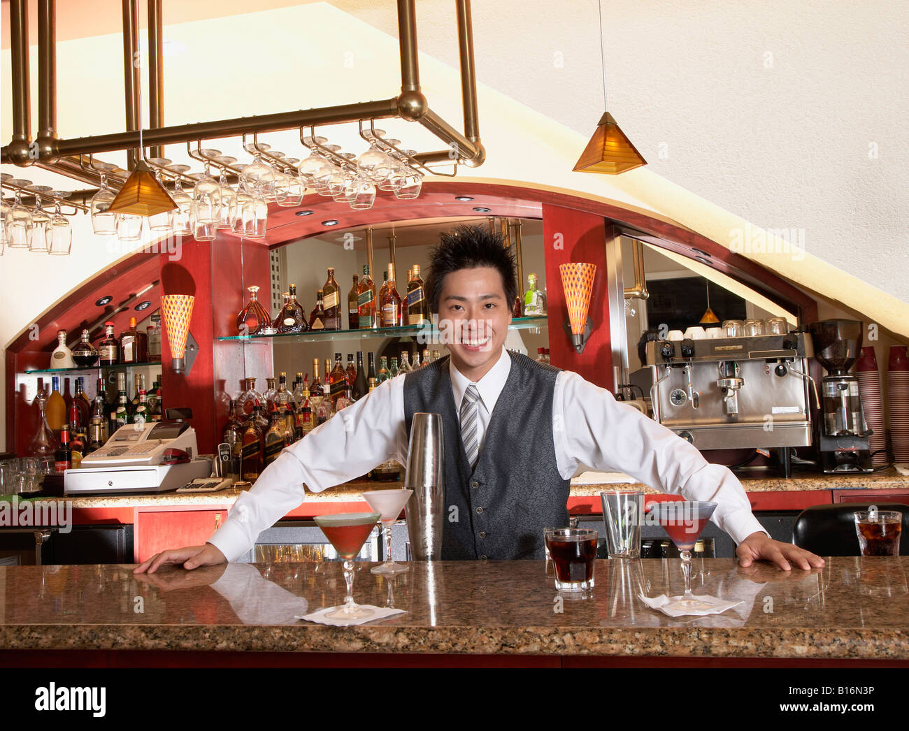 Asian male bartender and cocktails Stock Photo - Alamy