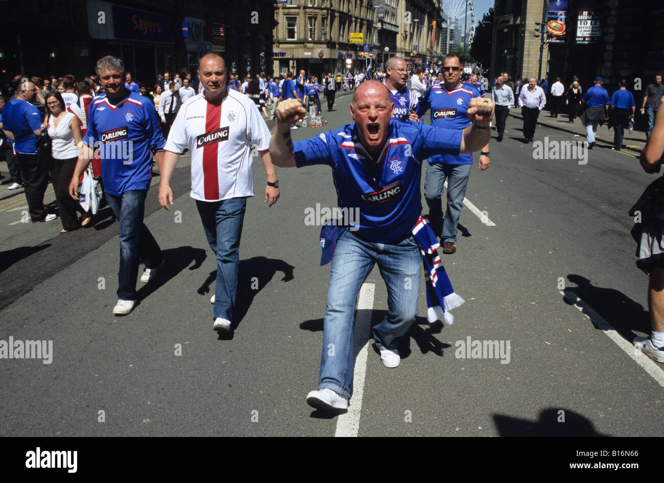 Glasgow Rangers Supporters Walking Through The Centre Of Manchester ...