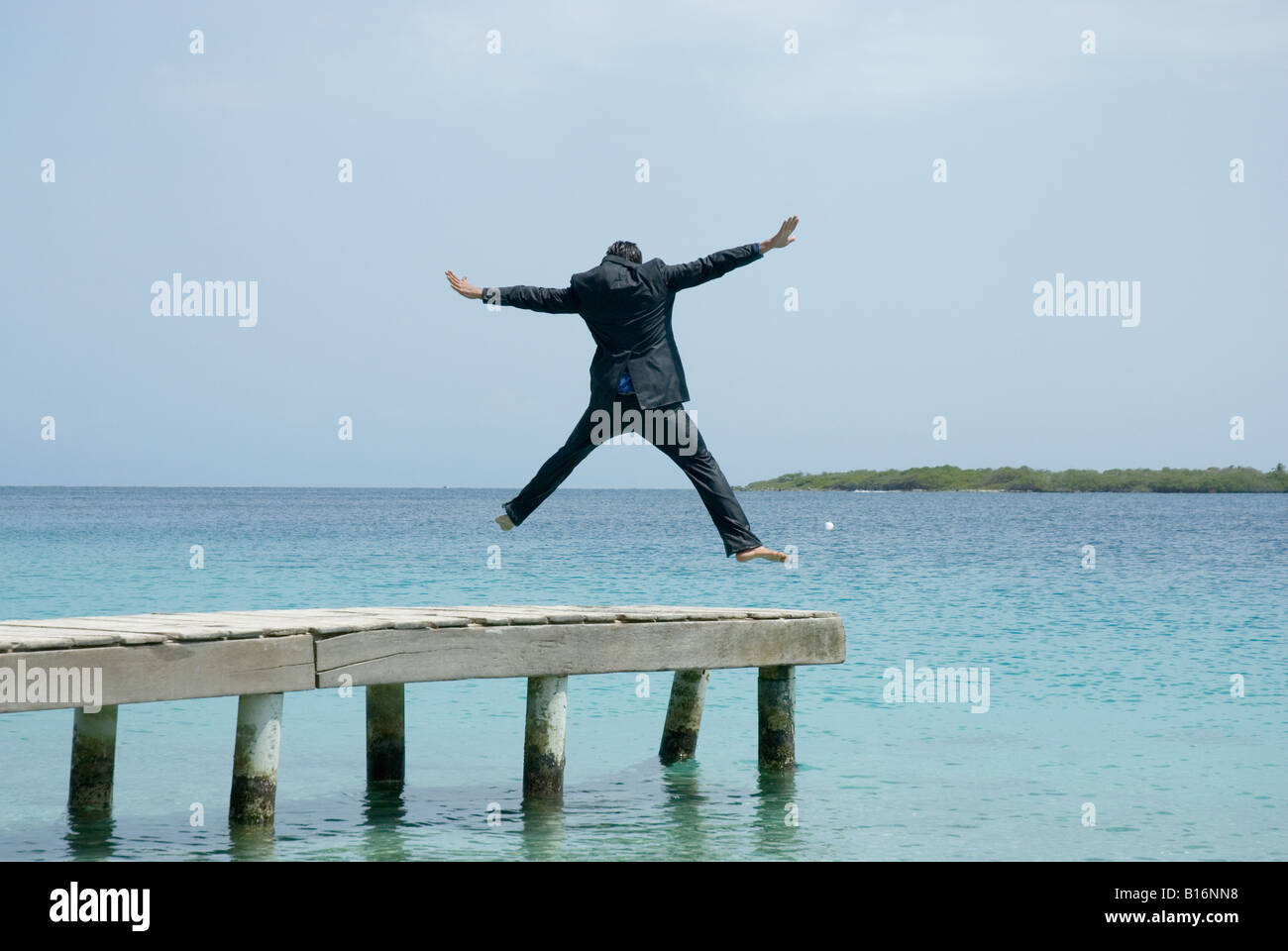Young Men Jumping From Dock High Resolution Stock Photography and ...